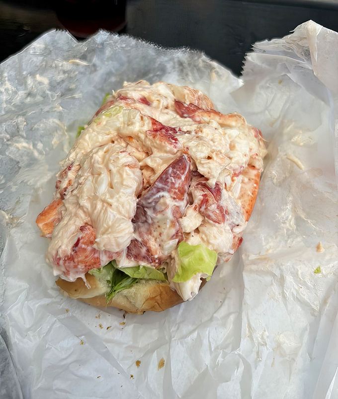 This lobster roll isn't playing games&mdash;chunks of sweet meat spilling over the edges of a toasted bun like a delicious rebellion against portion control.
