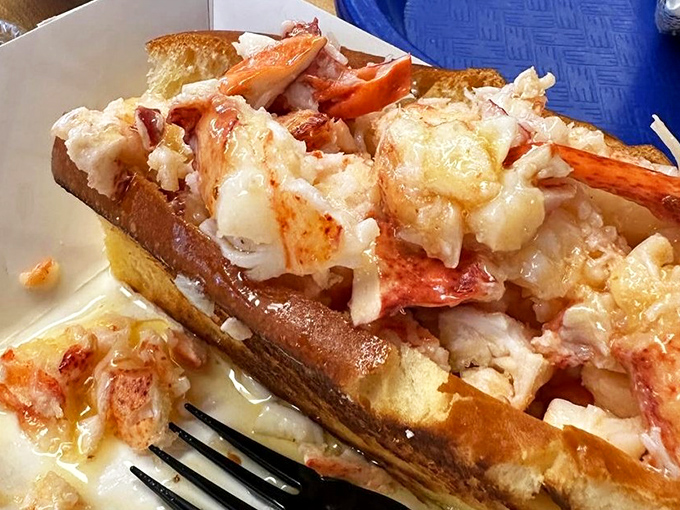 The lobster roll that launched a thousand road trips. Sweet chunks of lobster meat nestled in buttery perfection&mdash;summer on a bun.