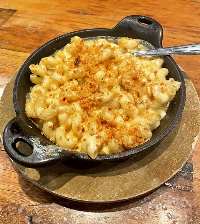 Mac and cheese that doesn't know it's not supposed to be life-changing. The crispy top layer is like the crust on a perfect cr&egrave;me br&ucirc;l&eacute;e.