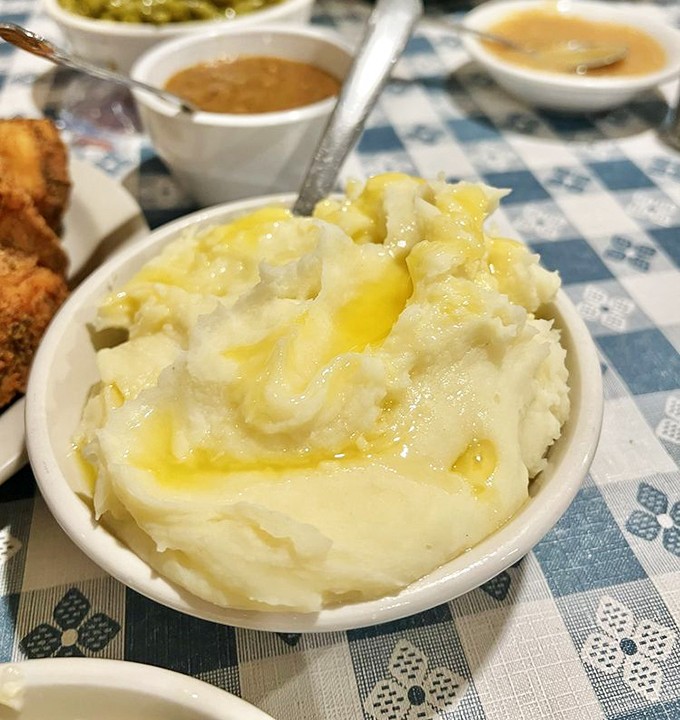 These mashed potatoes aren't just a side dish – they're a buttery cloud waiting for gravy rainfall.
