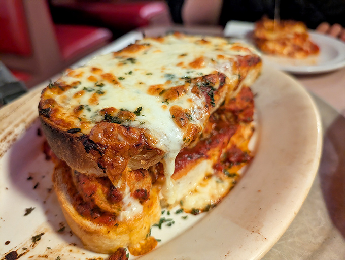 Not just a meatball sub—it's an architectural marvel of sauce, cheese, and meatballs that requires both hands and zero dignity.