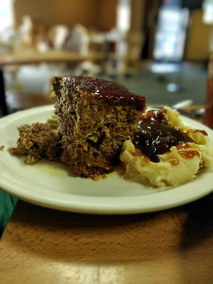 Meatloaf that would make your grandmother jealous, swimming in gravy that deserves its own fan club.