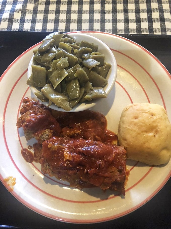 Southern comfort on a plate&mdash;meatloaf with a tangy tomato glaze, tender green beans, and a biscuit that could make your grandmother jealous.
