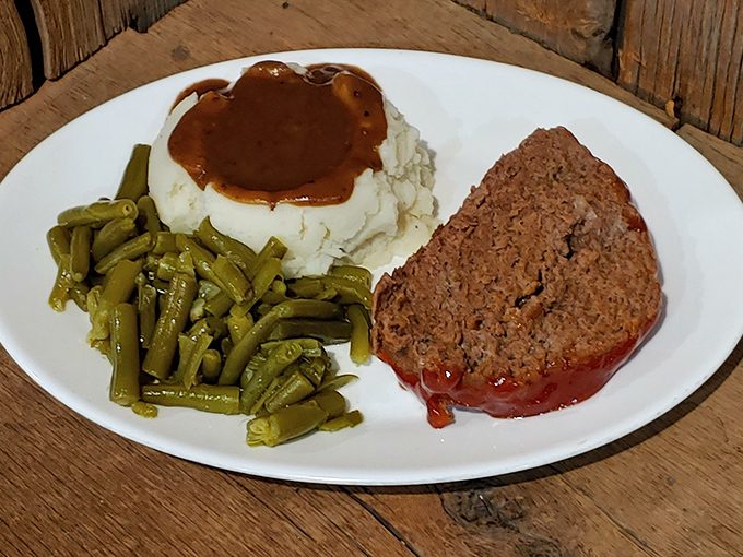 Meatloaf that would make your grandmother both proud and jealous, served with green beans that actually taste like vegetables should.