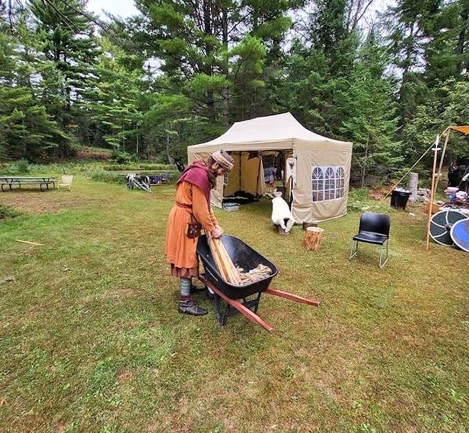 
Time travel is alive and well at Kelley Castle, where medieval reenactors bring history to life. That wheelbarrow probably hauls fewer plague victims and more camping supplies these days.