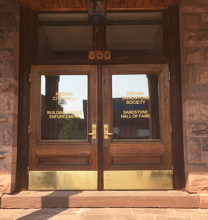 Behind these doors lies the Sandstone Hall of Fame—Medina's tribute to its geological claim to fame. Who knew rocks could have such an impressive résumé?