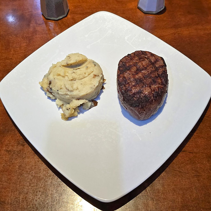 Filet mignon and mashed potatoes: proof that sometimes the simplest combinations are the most profound. Meat poetry on a plate.