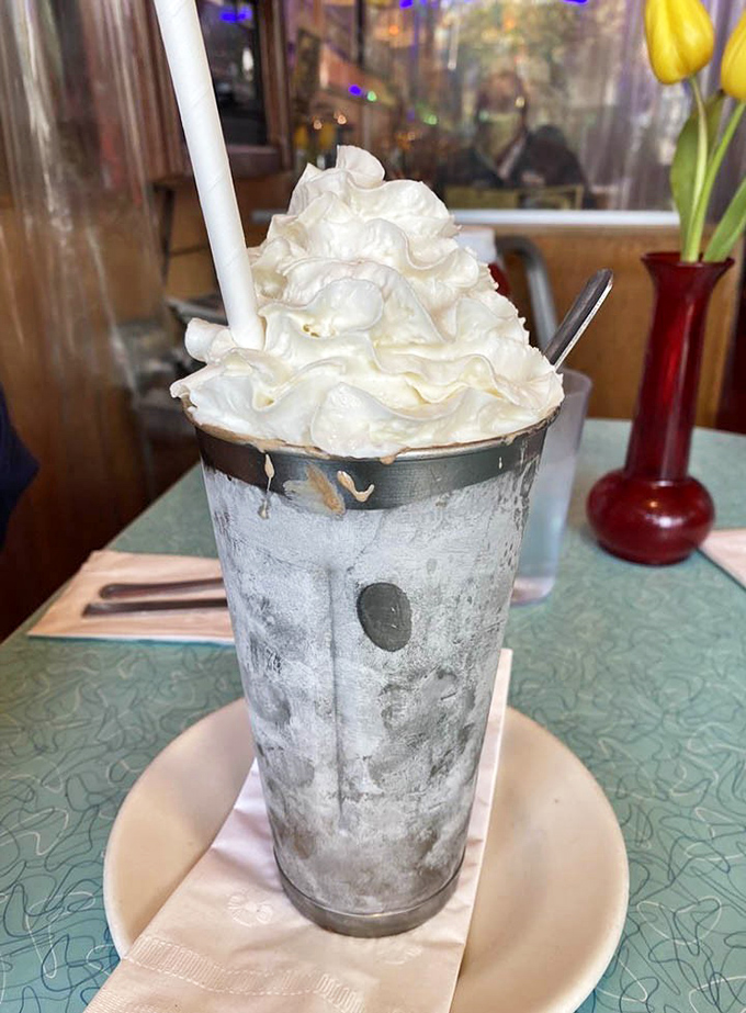 This milkshake mountain of whipped cream makes you feel like a kid who just discovered the meaning of happiness.