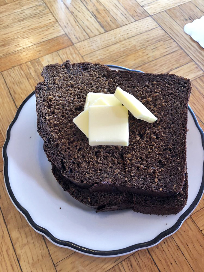 Dark, rich molasses bread that doesn't need butter but gets it anyway&mdash;because some relationships are just meant to be.