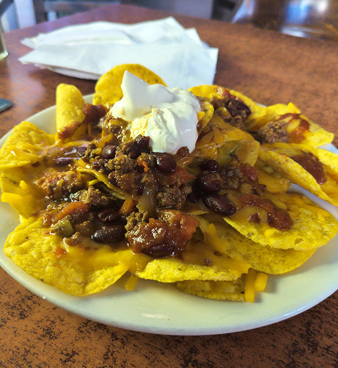 These aren't your movie theater nachos. Loaded with homemade chili and melted cheese, they're the perfect companion for watching the Eagles crush someone's dreams.