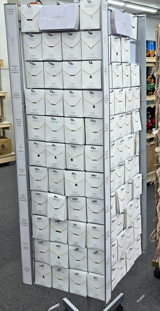 A wall of personalized possibilities. Find your name, find your style, and walk away with a necklace that's uniquely yours.