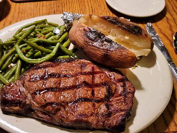 A New York Strip with grill marks so perfect they could make a geometry teacher weep with joy.