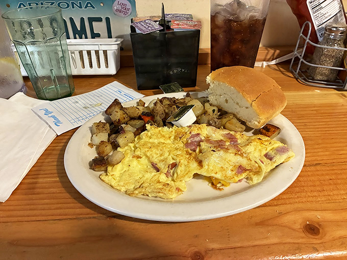 The ham and cheese omelet arrives with potatoes that have achieved that perfect crispy-outside, tender-inside nirvana all potatoes aspire to.