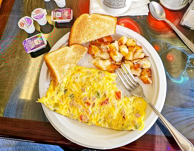 This isn't just an omelet&mdash;it's a morning masterpiece with home fries that have achieved the crispy-outside, fluffy-inside holy grail.