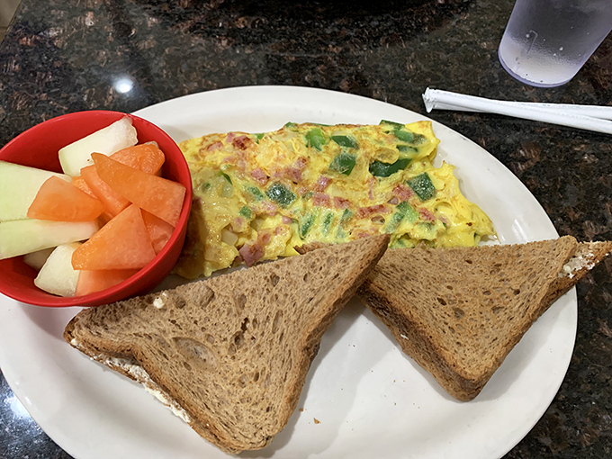 A western omelet that doesn't need fancy plating to impress &ndash; just honest ingredients, proper technique, and toast ready for the dipping. Pure breakfast poetry.