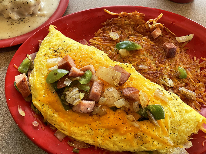 This omelet doesn't just contain ham and peppers &ndash; it celebrates them, alongside hash browns that achieve the perfect crisp-to-tender ratio.