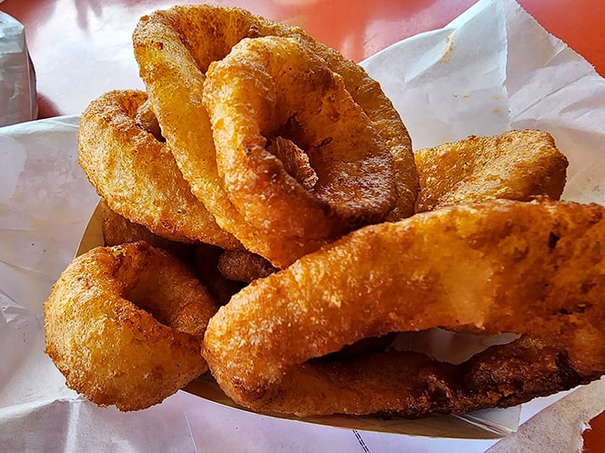 These aren't just onion rings; they're golden halos of crispy perfection that make the perfect sidekick to sandwich royalty.