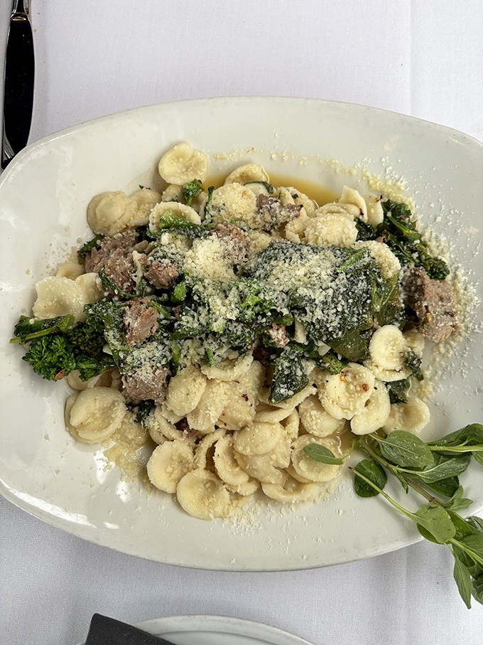 Orecchiette ("little ears") pasta catching every bit of flavor from sausage and greens. These little pasta pockets are basically flavor catchers.