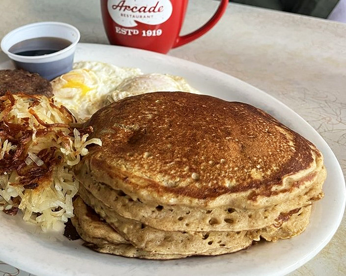 Stack attack! These golden pancakes aren't just breakfast, they're an edible pillow fort that makes Monday mornings bearable again.