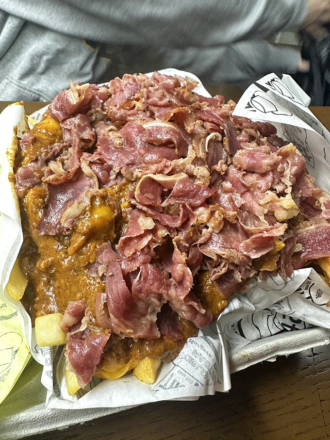 This isn't just fries with pastrami on top&mdash;it's a full-scale invasion of flavor that demands your attention.