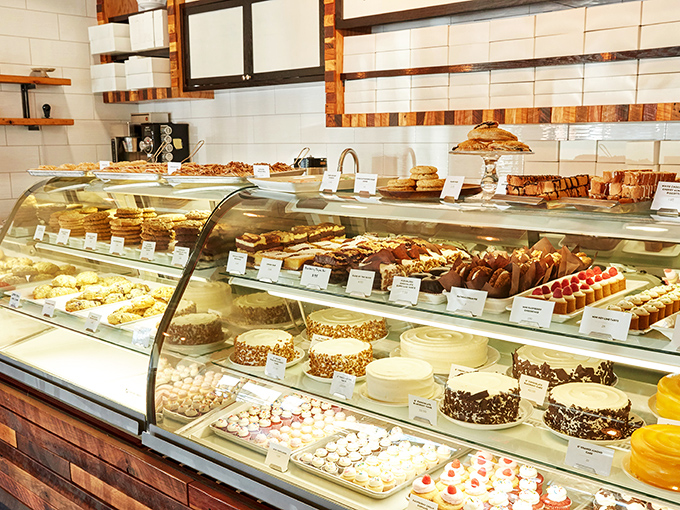 The display case at Dolce isn't just a showcase—it's a museum of edible art where every shelf tells a different delicious story.