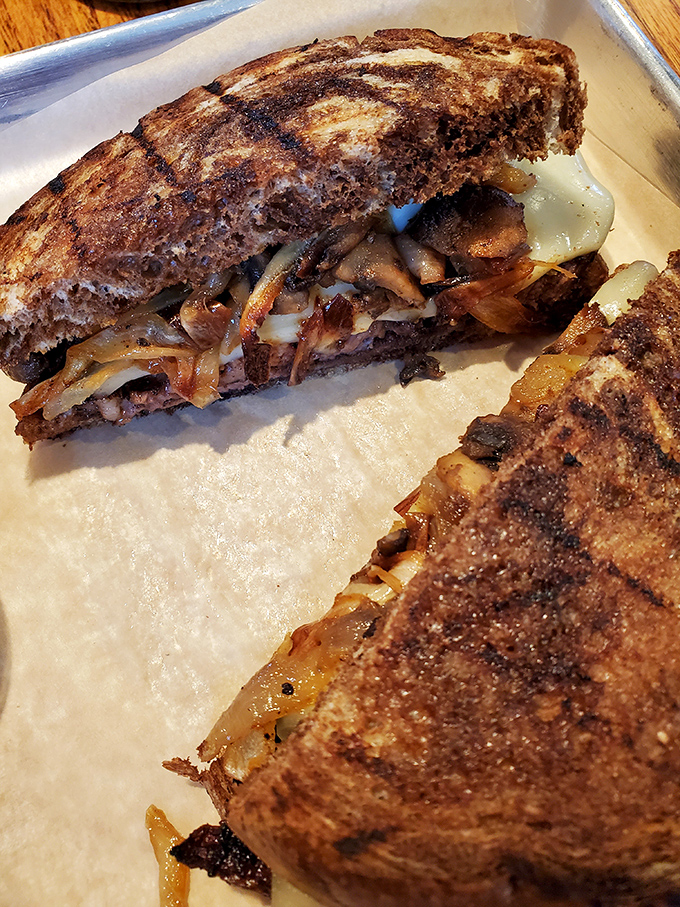 Not just any patty melt&mdash;this grilled masterpiece showcases the beautiful marriage of melted cheese, caramelized onions, and perfectly seasoned meat.