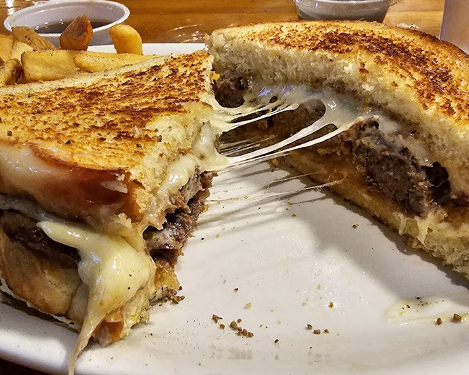 This patty melt isn't just a sandwich&mdash;it's a masterclass in the art of cheese-pulling that would make any Instagram food influencer weep with joy.