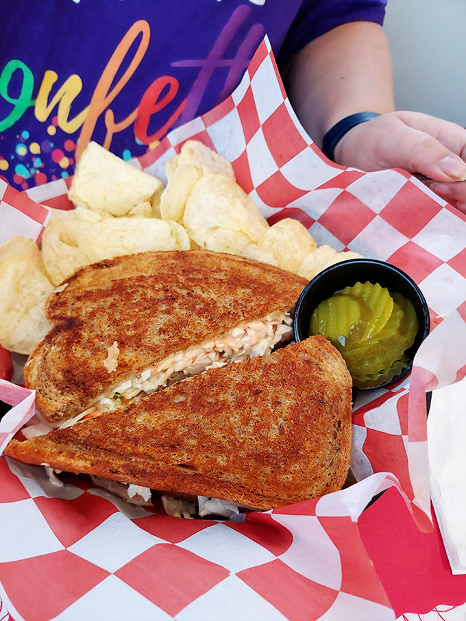 The patty melt: where grilled bread, melted cheese, and seasoned beef unite in a sandwich that makes you forget your troubles.