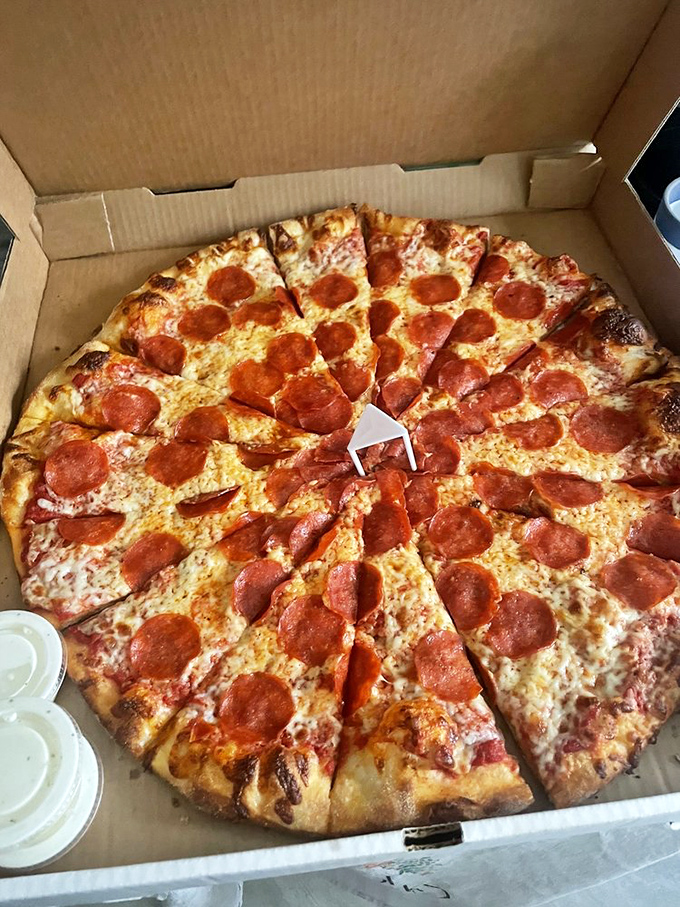 The pepperoni pizza that launched a thousand cravings—those perfectly curled cups of spicy goodness are basically little flavor hot tubs.