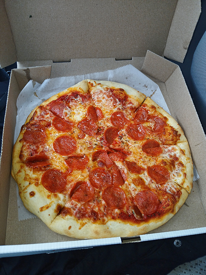 This pepperoni pizza doesn't need filters or fancy lighting&mdash;it's the real-deal circular masterpiece that Instagram food influencers wish they could discover first.