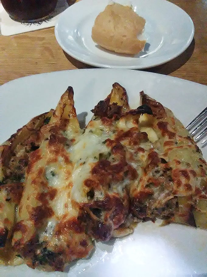 These cheesy triangles of joy aren't just appetizers&mdash;they're the opening act to a symphony of flavors that will have you planning your next visit.