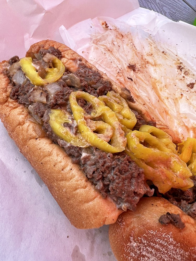 The classic Philly cheesesteak with banana peppers &ndash; where beef meets cheese in a harmony so perfect it should have its own symphony.