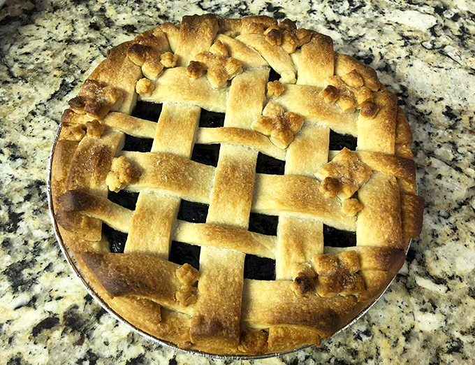 A lattice-top pie that would make grandmothers nod in approval and pie-eating contestants dream of glory.