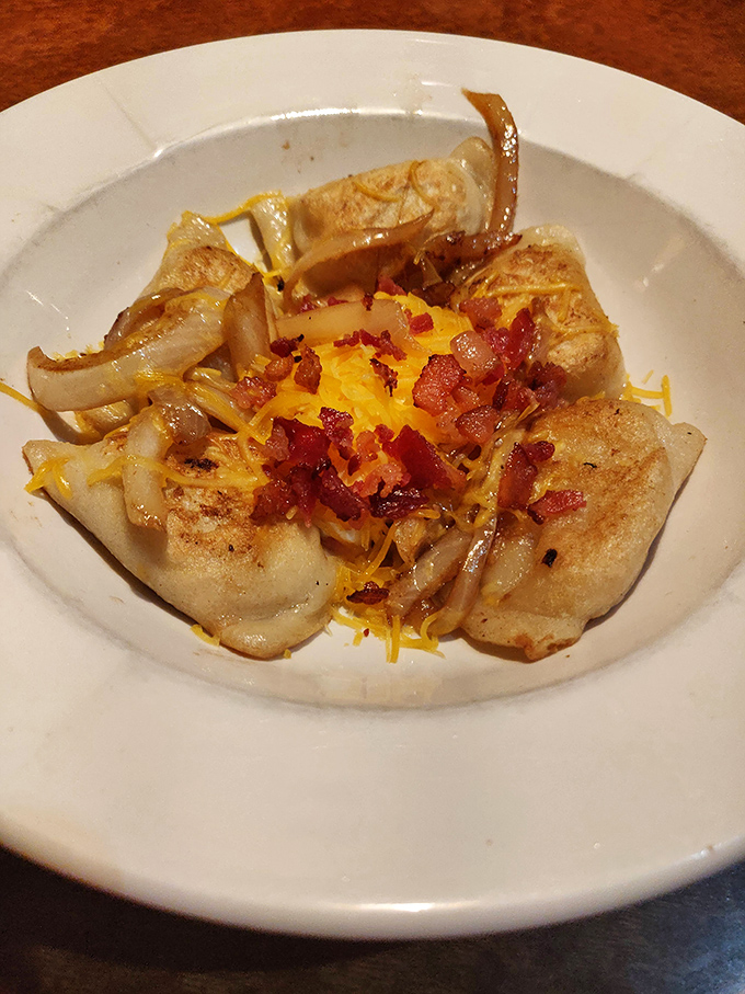 These pierogies aren't just food; they're little pockets of joy. Caramelized onions, bacon, and melted cheese transform this Polish classic into something transcendent.