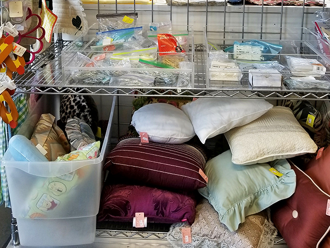 Pillows and linens stacked with care &ndash; because someone else's "no longer sparks joy" might be exactly what your guest bedroom needs.