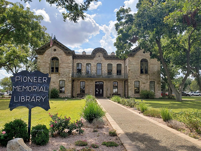 The Pioneer Memorial Library stands proud in limestone, a testament to the town's commitment to preserving history.