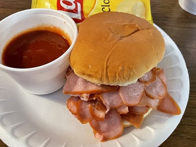 This Polish sausage sandwich isn't trying to impress Instagram&mdash;it's too busy impressing your taste buds. The side of sauce isn't optional, it's essential.