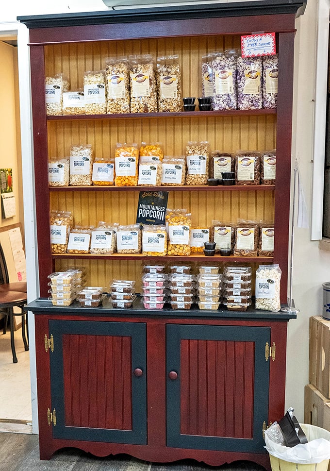 Popcorn paradise! This country cabinet houses bags of Mountaineer popcorn in flavors that put movie theater butter to shame &ndash; snacking elevated to an art form.