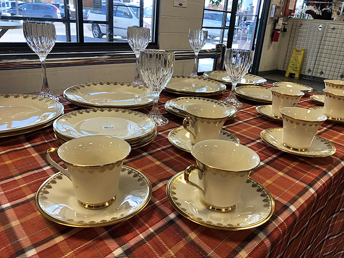 Delicate teacups and saucers stand at attention, gold-rimmed aristocrats patiently waiting for their invitation to your next afternoon gathering.