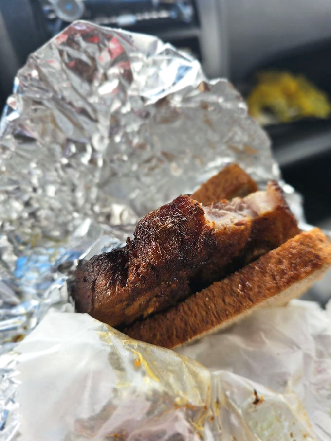 This isn't just a sandwich; it's a monument to pork perfection. The scrapple nestled between toast could convert even the most skeptical breakfast skeptic.