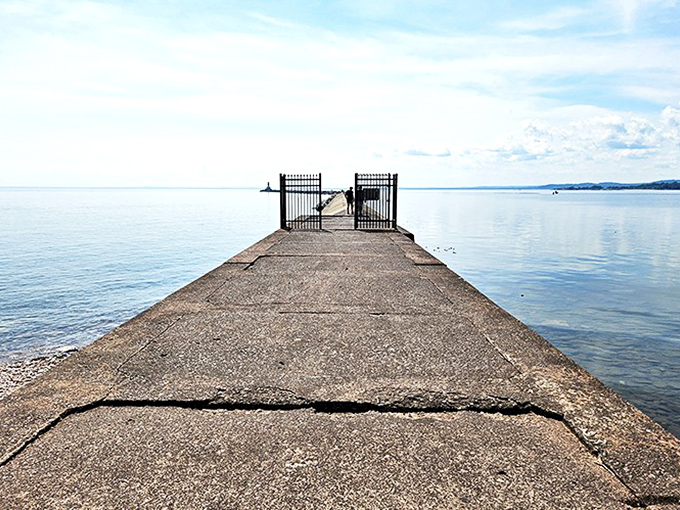 This pier stretches into Lake Superior like an invitation to contemplation—or a dare to jump in if you're feeling particularly alive.
