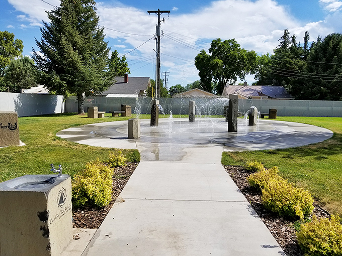 Preston's splash pad offers summer cooling that costs nothing but the price of a towel. Take that, expensive water parks!