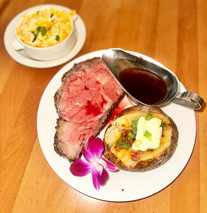 Prime rib so perfectly prepared it makes you wonder if the chef has some sort of meat telepathy. That loaded potato isn't just a side&mdash;it's a co-star.