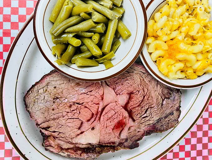 Prime rib so tender it practically surrenders to your fork, flanked by green beans and mac and cheese that would make your grandmother proud.
