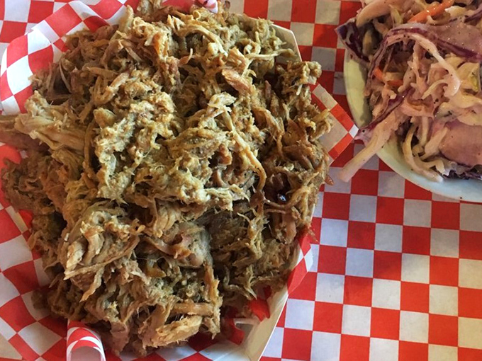 Pulled pork that doesn't need to be drowned in sauce to impress&mdash;tender, smoky strands piled high like a meaty treasure waiting to be discovered. 