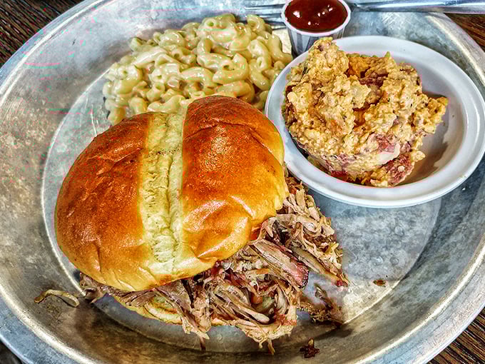 Digging into a fantastic plate of comfort food. Love that smoky flavor and those wonderful sides! Pure BBQ happiness.