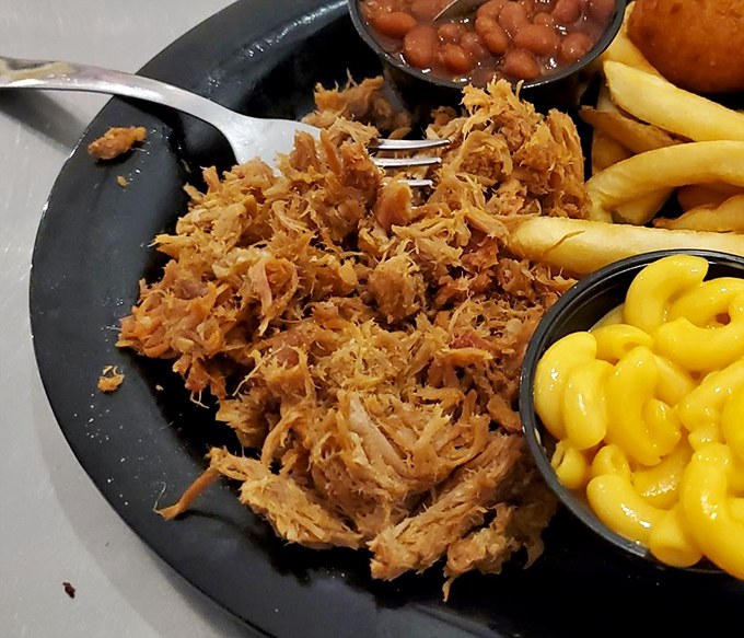 Pulled pork this perfect should come with a warning label: may cause involuntary happy dancing.