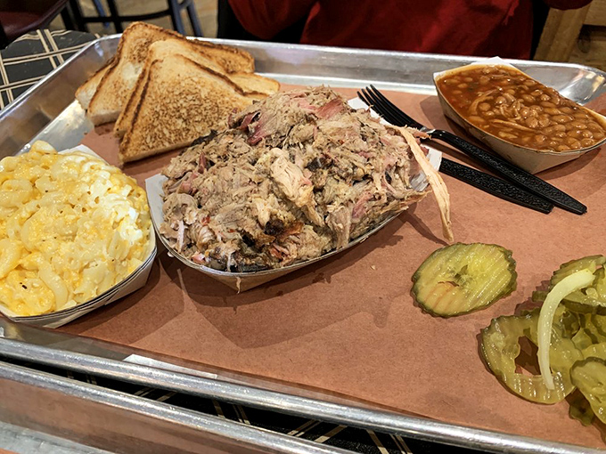 Pulled pork that's had a proper introduction to smoke, served with all the fixings. This tray is the definition of Southern comfort.