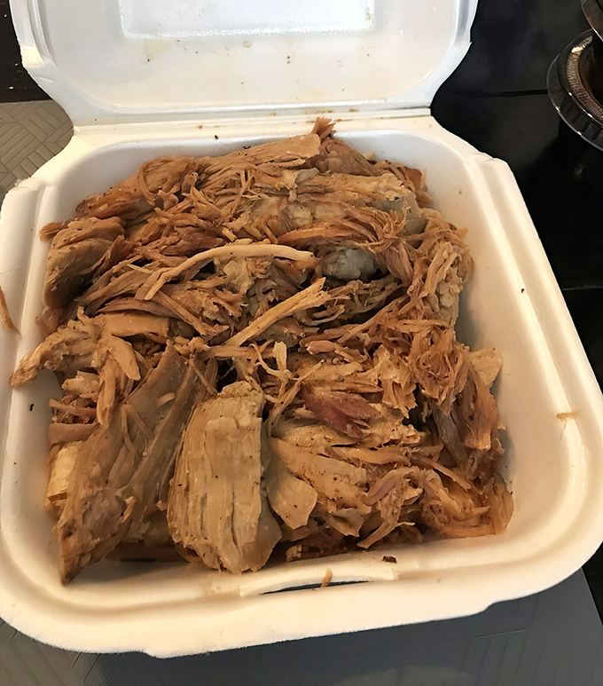 Pulled pork that's had a proper introduction to smoke and time. Each strand tells the story of hours spent becoming something greater than itself.