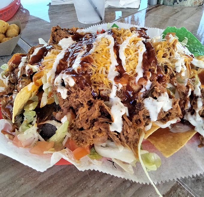 These pulled pork nachos aren't just a meal&mdash;they're an architectural marvel of crispy chips, tender meat, and enough cheese to make Wisconsin proud.
